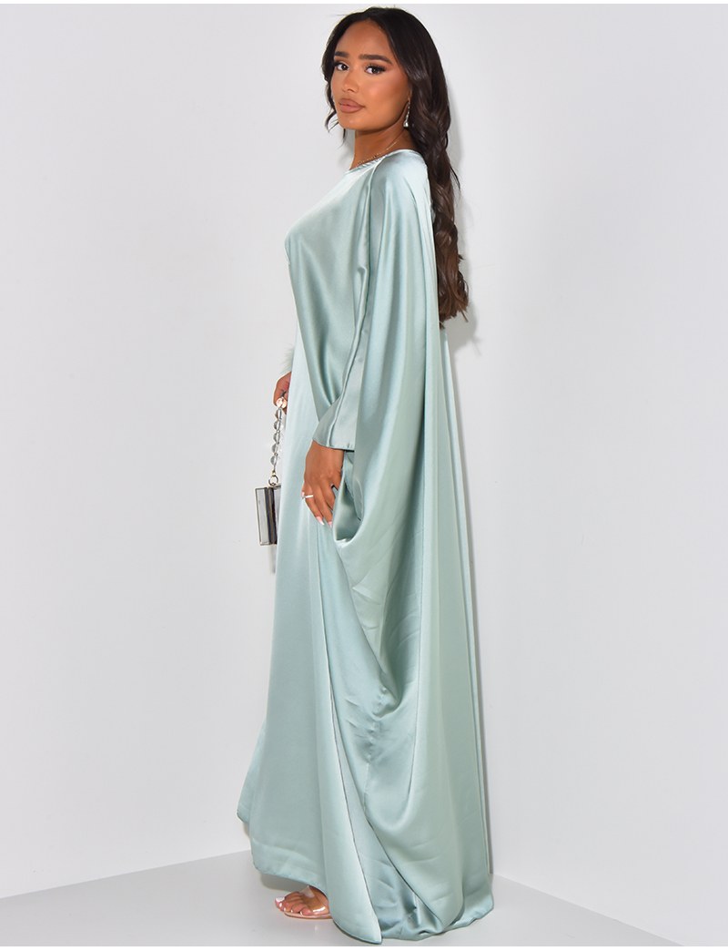 Loose-fitting satin dress, adjustable at the waist, with fur trim at ...